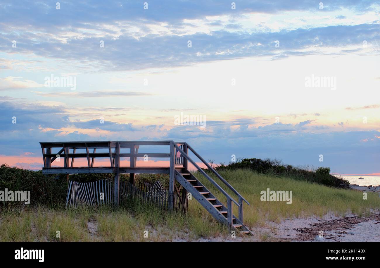 Beautiful Cape Cod beach scene with colorful summer sky and offshore ...