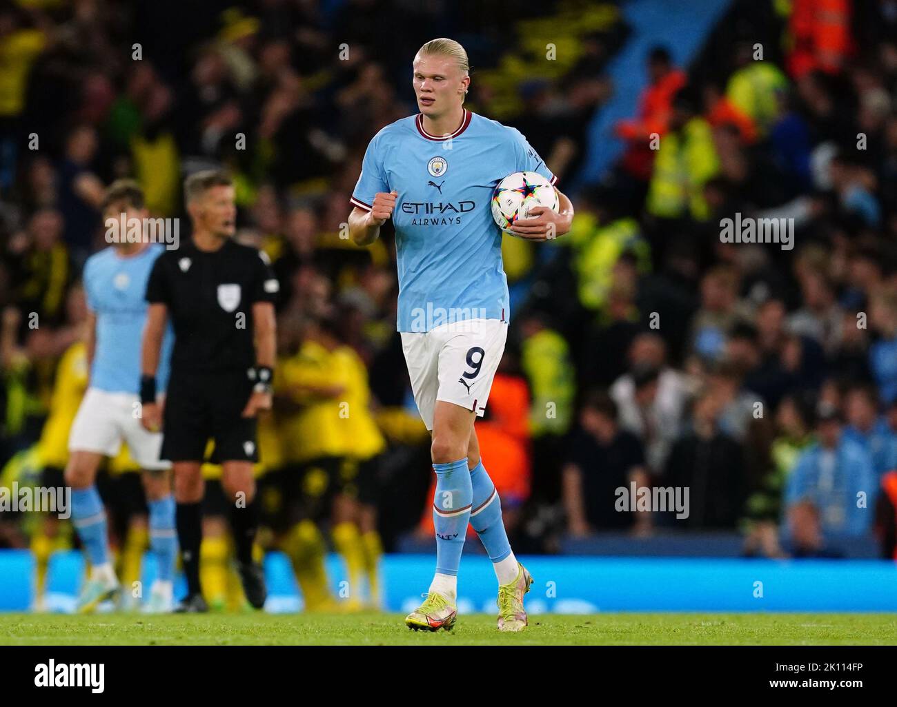 Manchester City's Erling Haaland reacts following the goal of Borussia ...