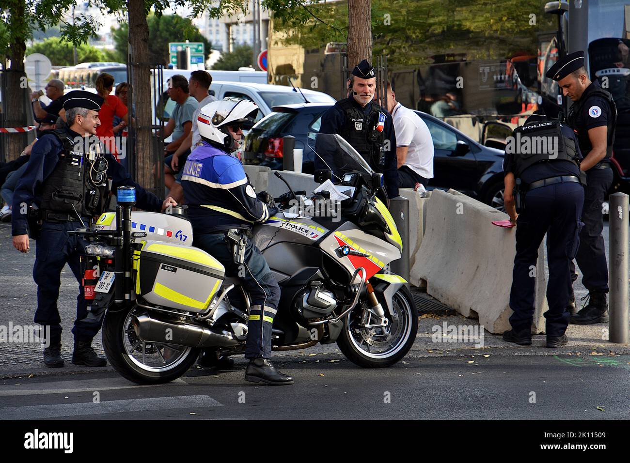 Police on guard in Place de la Joliette. As part of the Champions ...