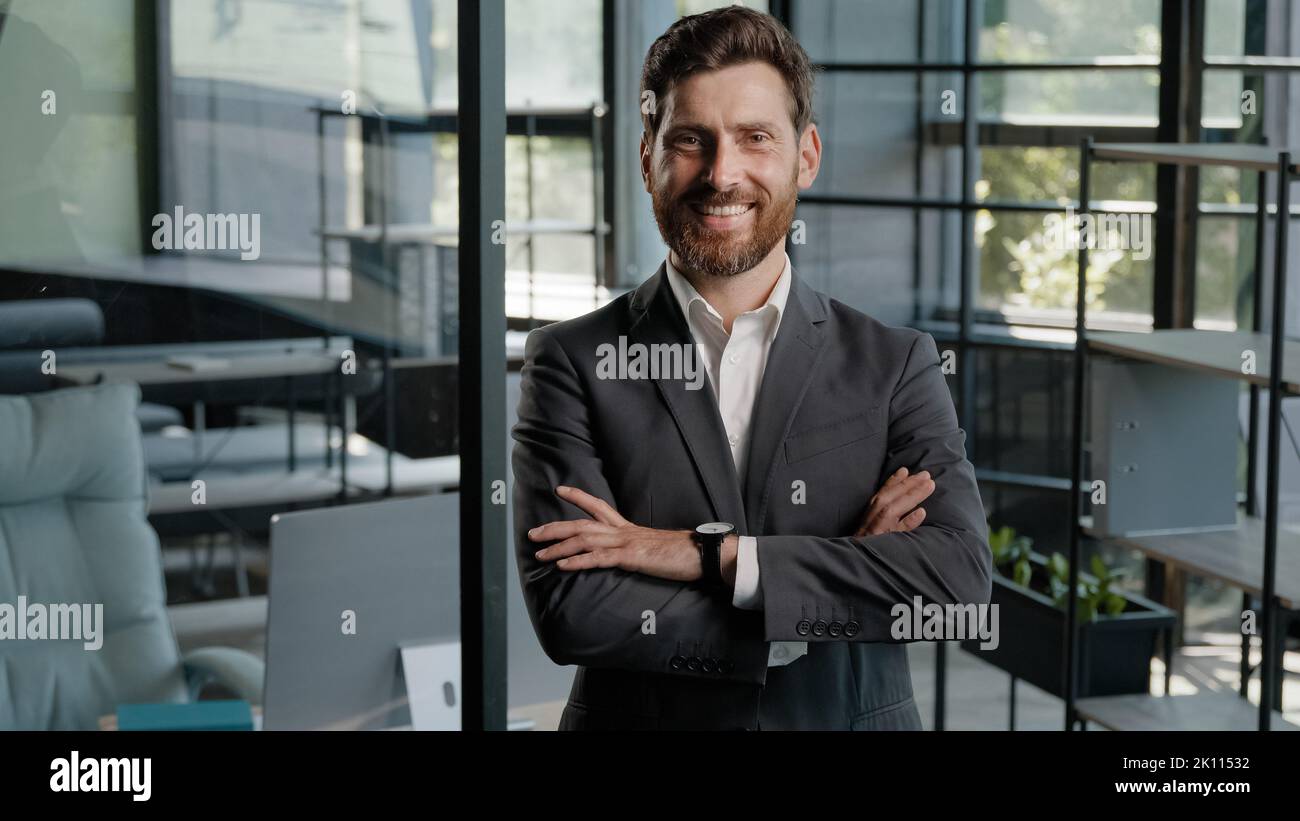 Portrait in modern company office confident mature middle-aged ...