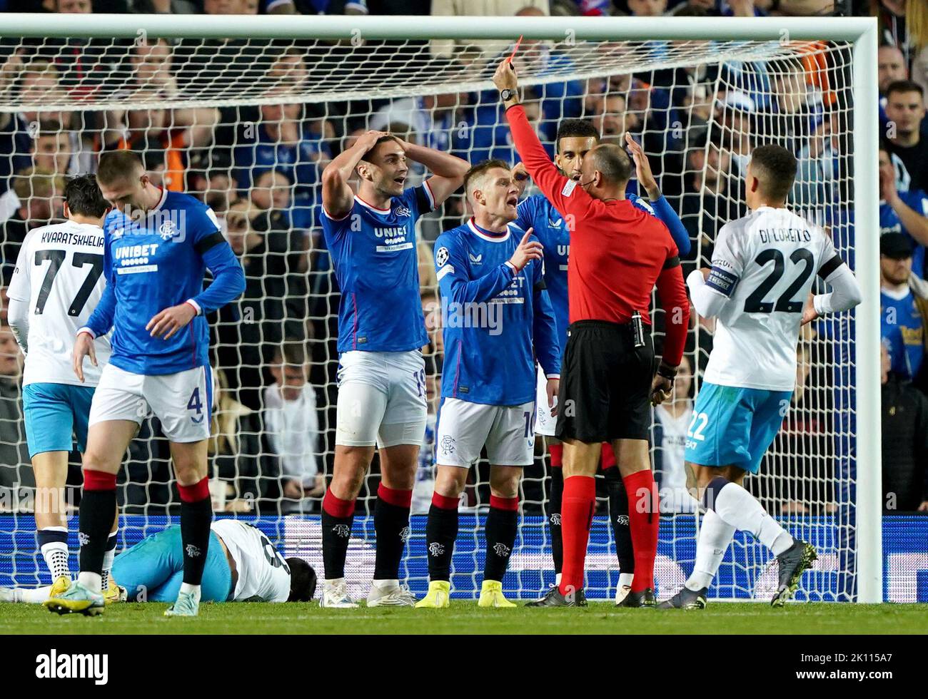 Rangers' James Sands (centre) is shown a red card during the UEFA ...