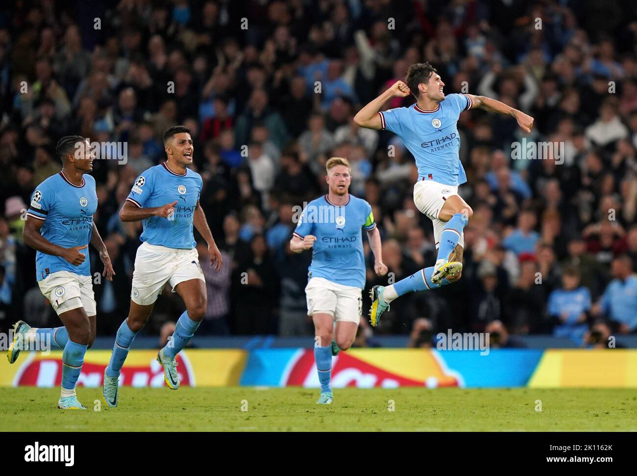 Manchester City's John Stones (right) celebrates scoring their side's ...
