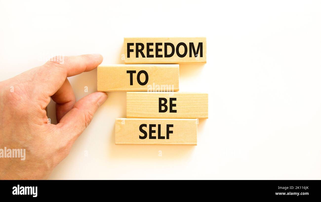 Freedom to be self symbol. Concept words Freedom to be self on wooden ...