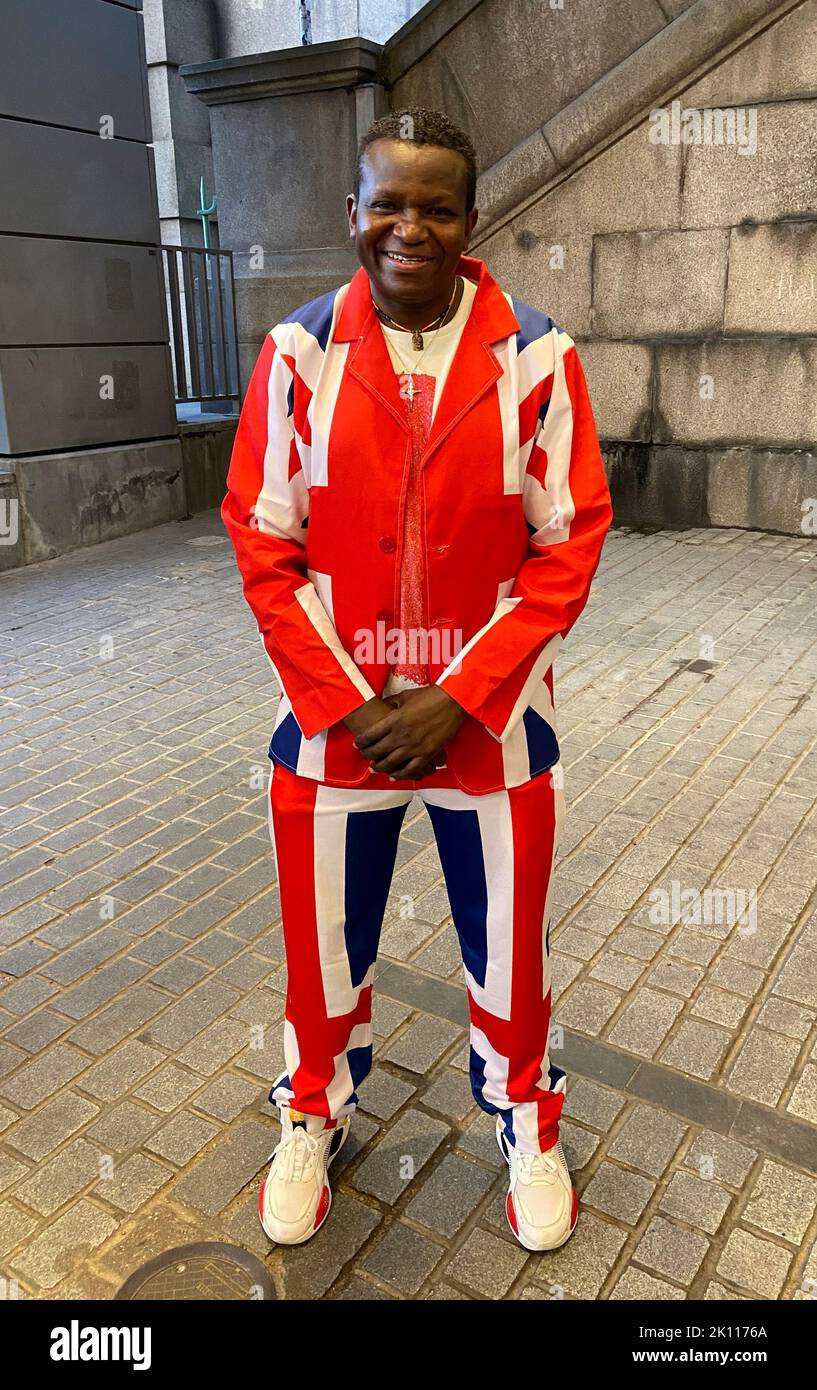 Dr Henry Mumbi, 55, from Cricklewood, north-west London, wearing a ...