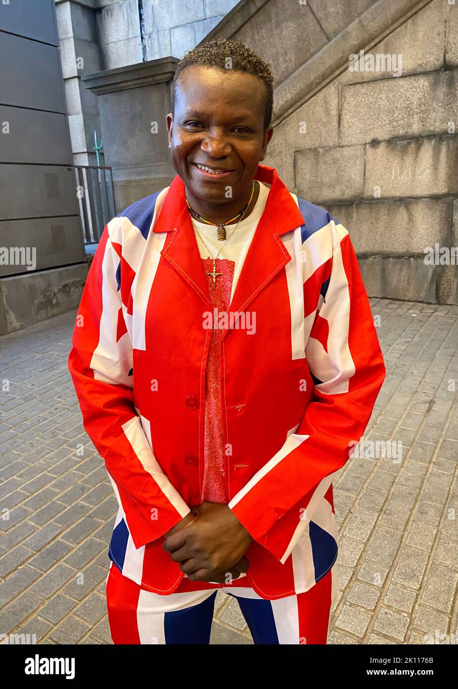 Dr Henry Mumbi, 55, from Cricklewood, north-west London, wearing a ...