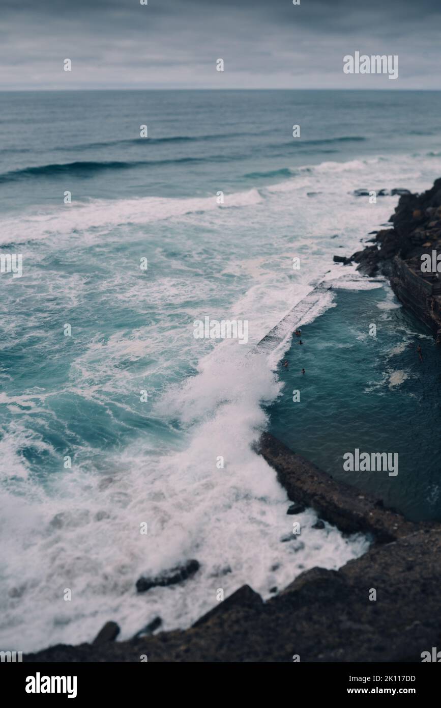 View to Azenhas do Mar rocky beach and village in Colares, Portugal ...