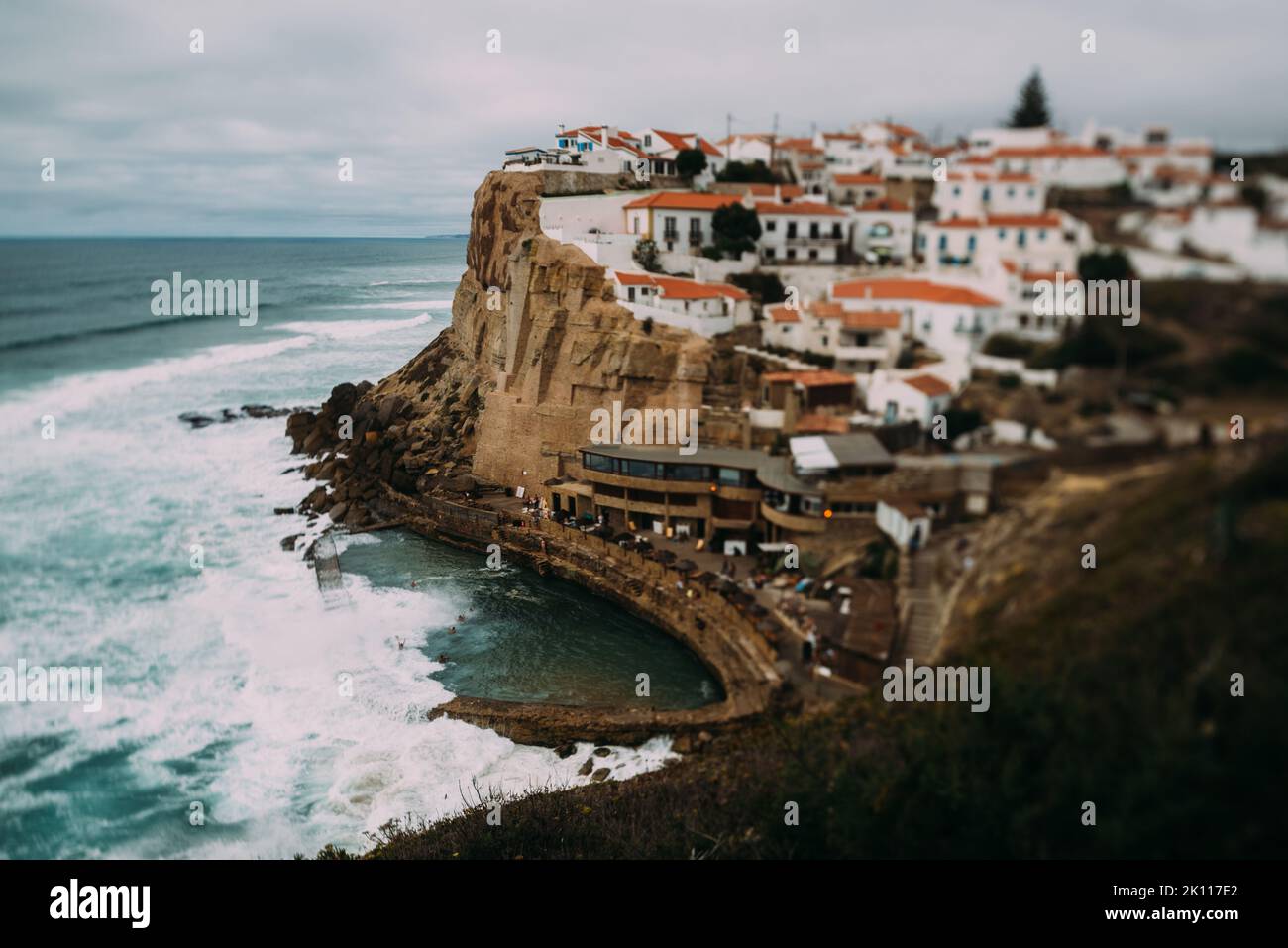 View to Azenhas do Mar rocky beach and village in Colares, Portugal ...