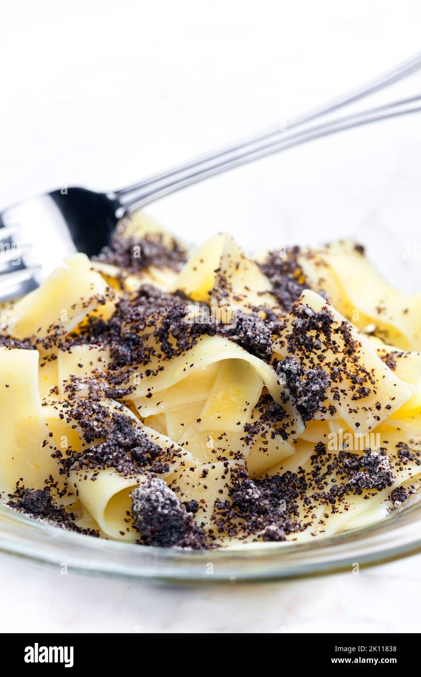 pasta with poppy seeds and powder sugar Stock Photo - Alamy