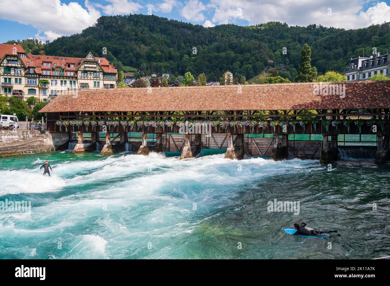 Covered Bridge on the River Aar, in Thun, village on the Thunersee ...
