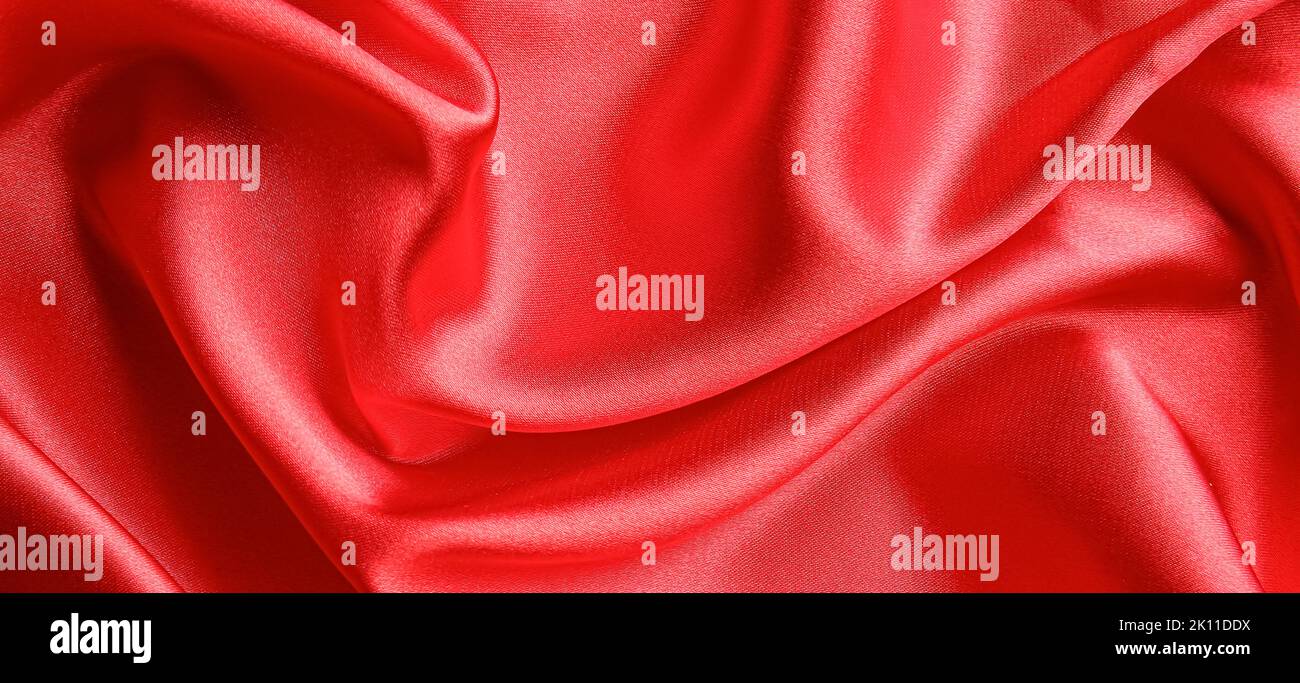 Texture of bright red fabric, top view Stock Photo - Alamy
