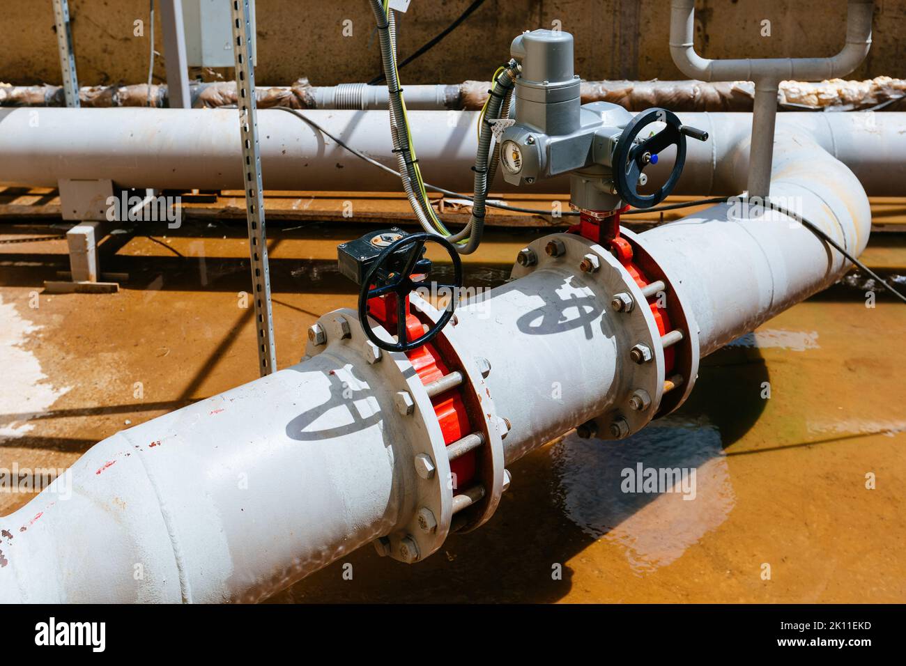Steel pipes with valves in the factory Stock Photo - Alamy