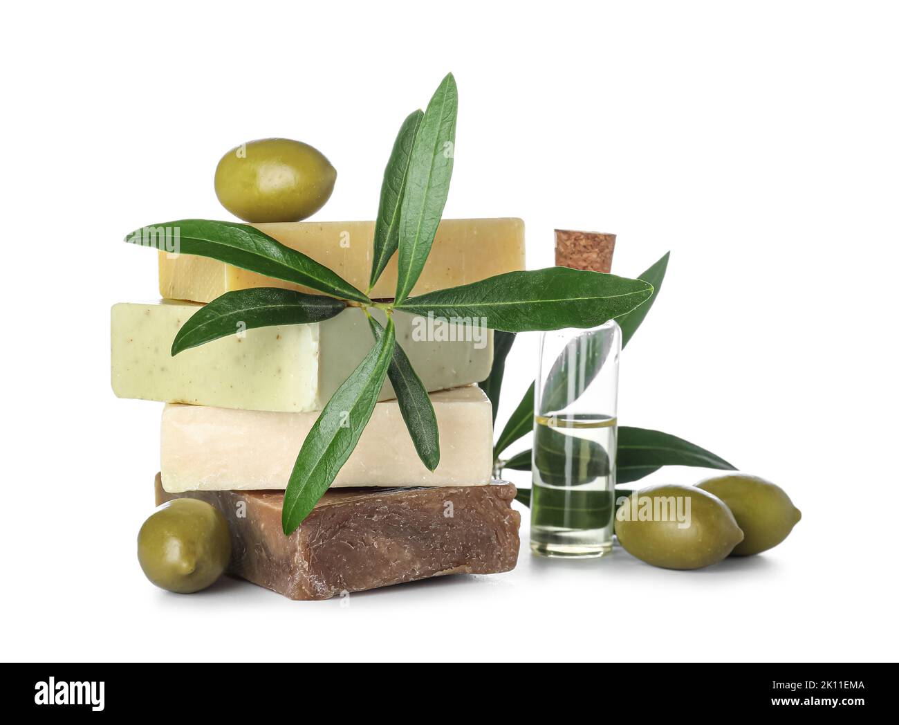 Stack of olive soap bars and essential oil on white background Stock ...