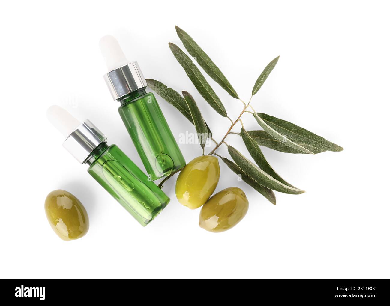 Bottles of essential olive oil on white background Stock Photo - Alamy