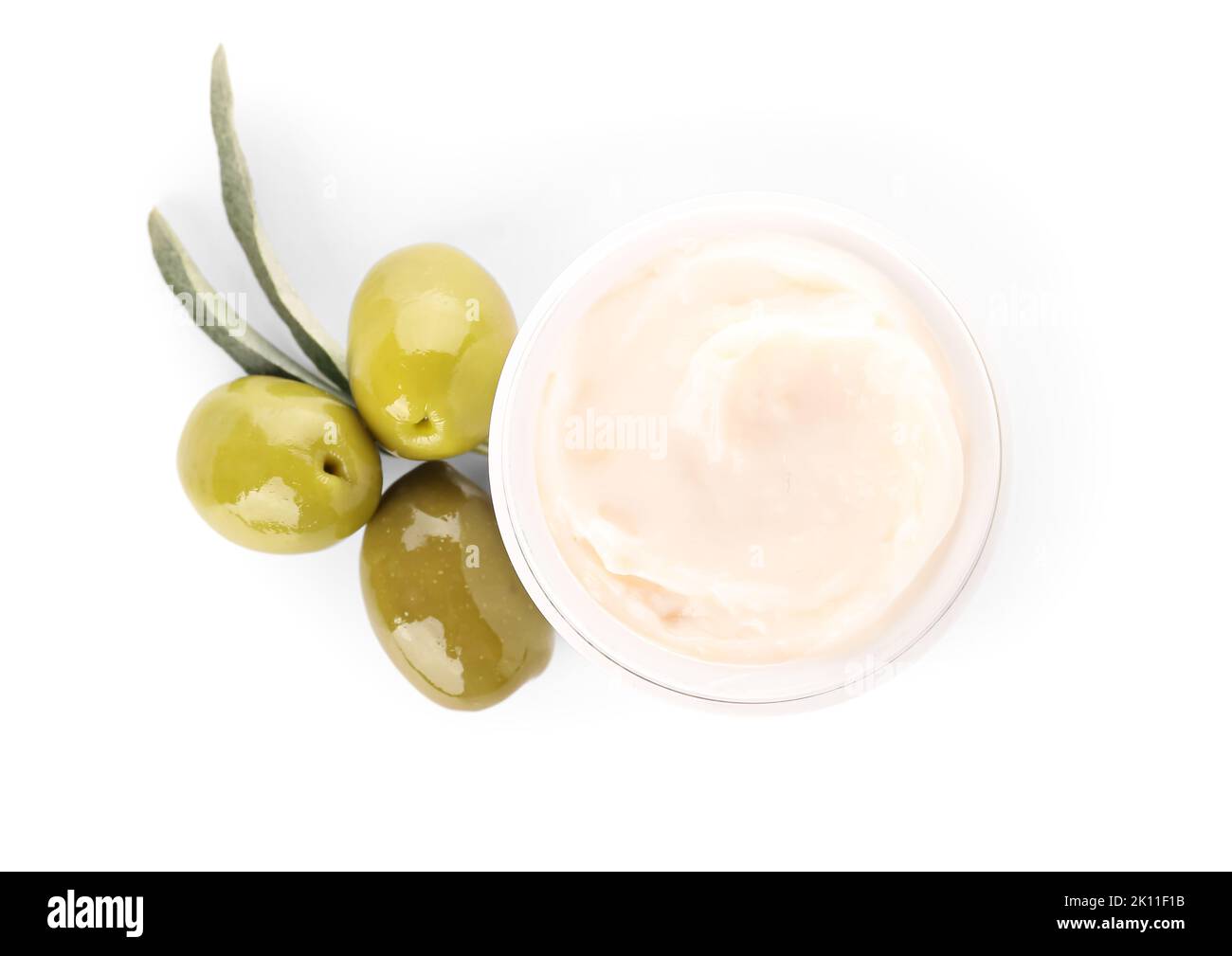 Jar of natural olive cream on white background Stock Photo - Alamy