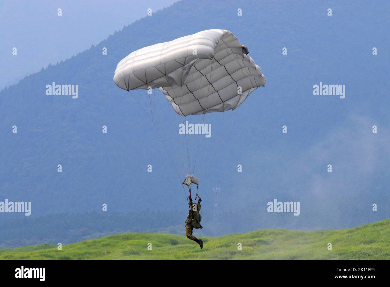 A paratrooper of Japan Ground Self-Defense Force parachute display ...