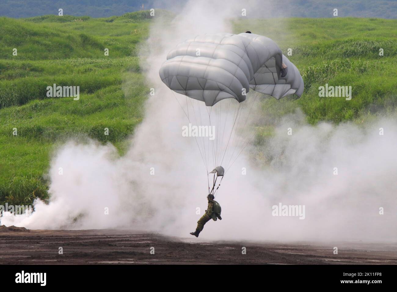 A paratrooper of Japan Ground Self-Defense Force parachute display ...