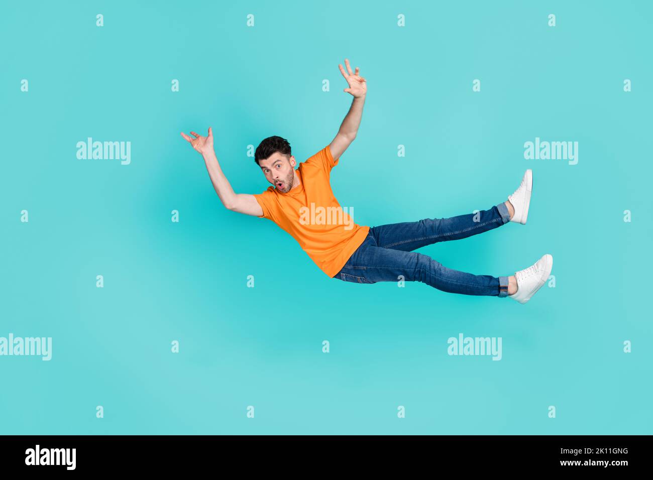 Full size photo of guy falling down feel stupor isolated on aquamarine ...