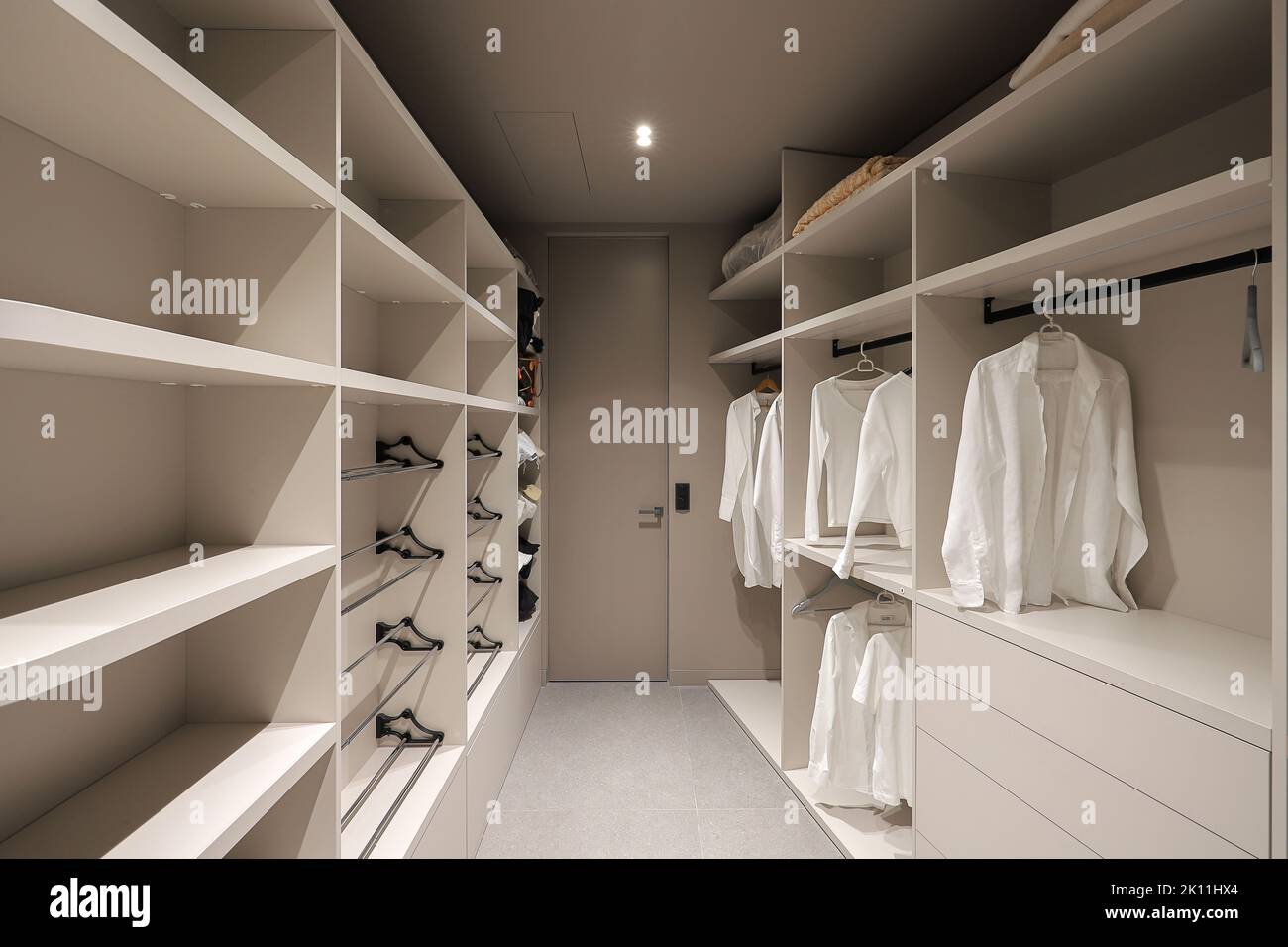 Inside empty modern dressing room interior with shelves Stock Photo - Alamy