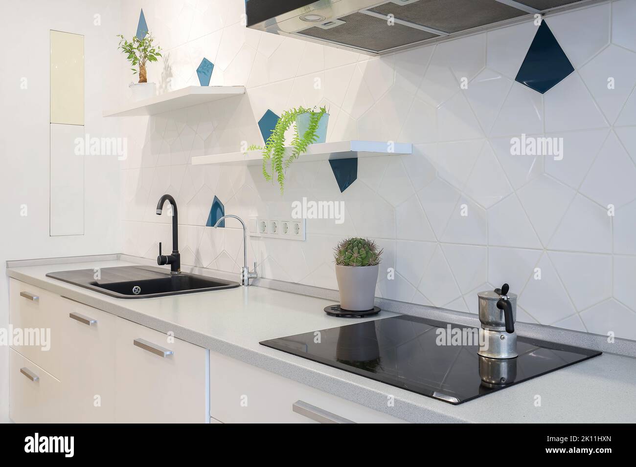 Faucet and sink in the kitchen Stock Photo - Alamy