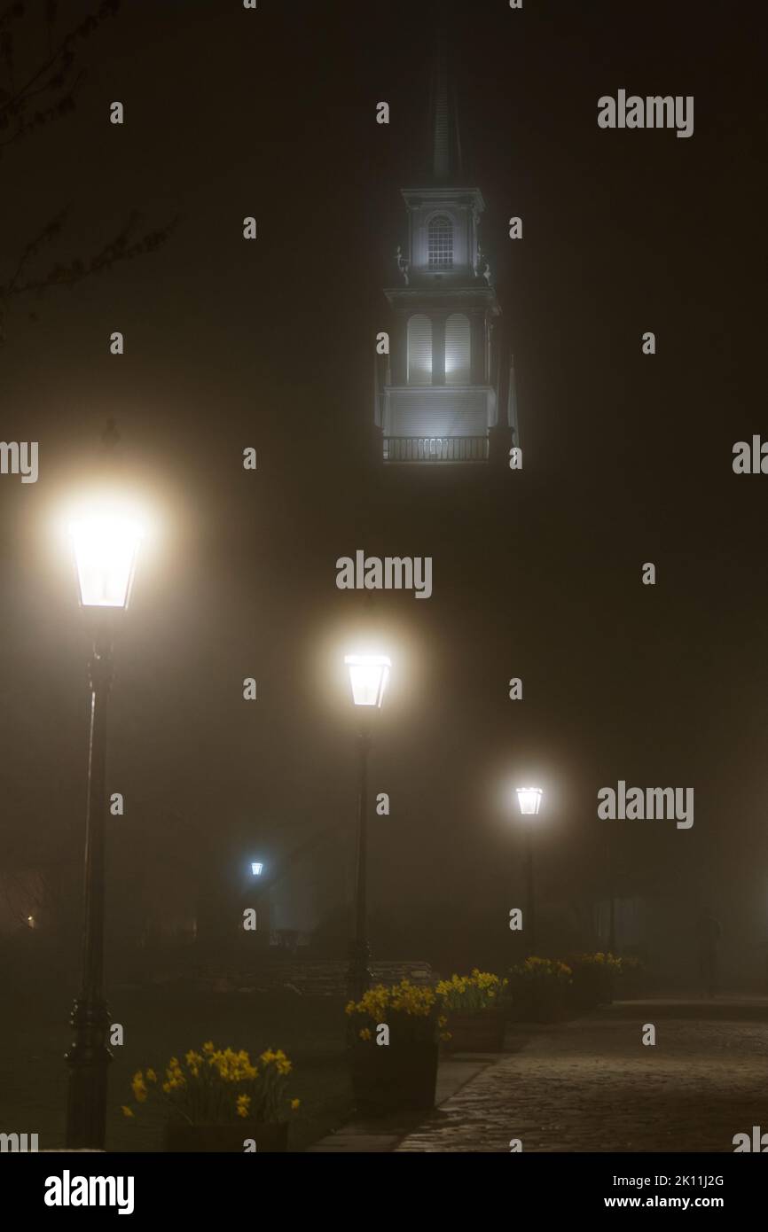 Newport clock bell tower church on a foggy night Stock Photo - Alamy