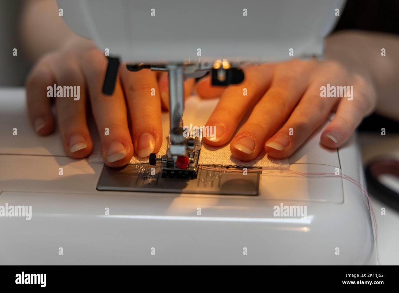 A pupil from Kyle Academy in Ayr, practices sewing skills. Picture date ...