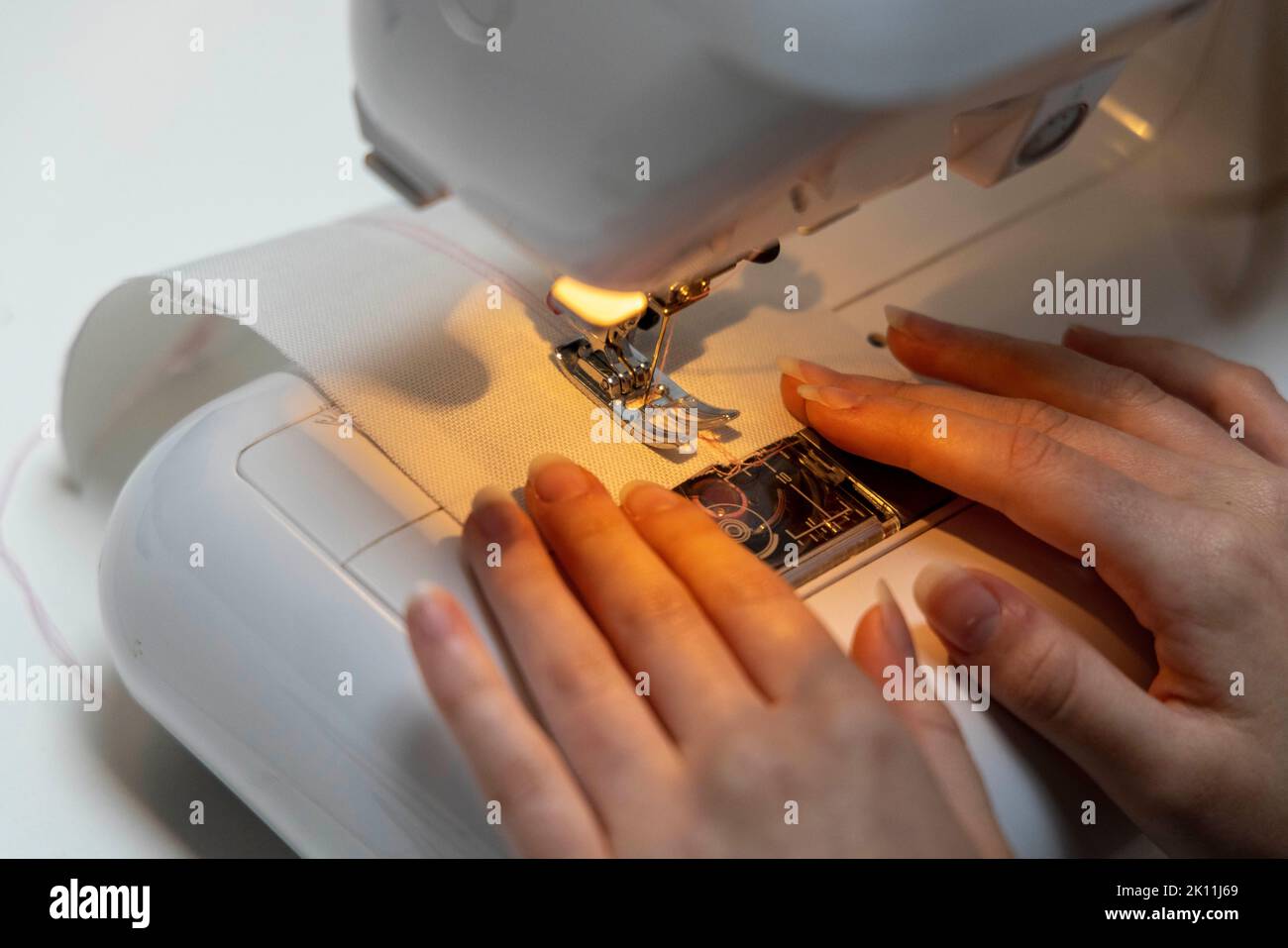 A pupil from Kyle Academy in Ayr, practices sewing skills. Picture date ...