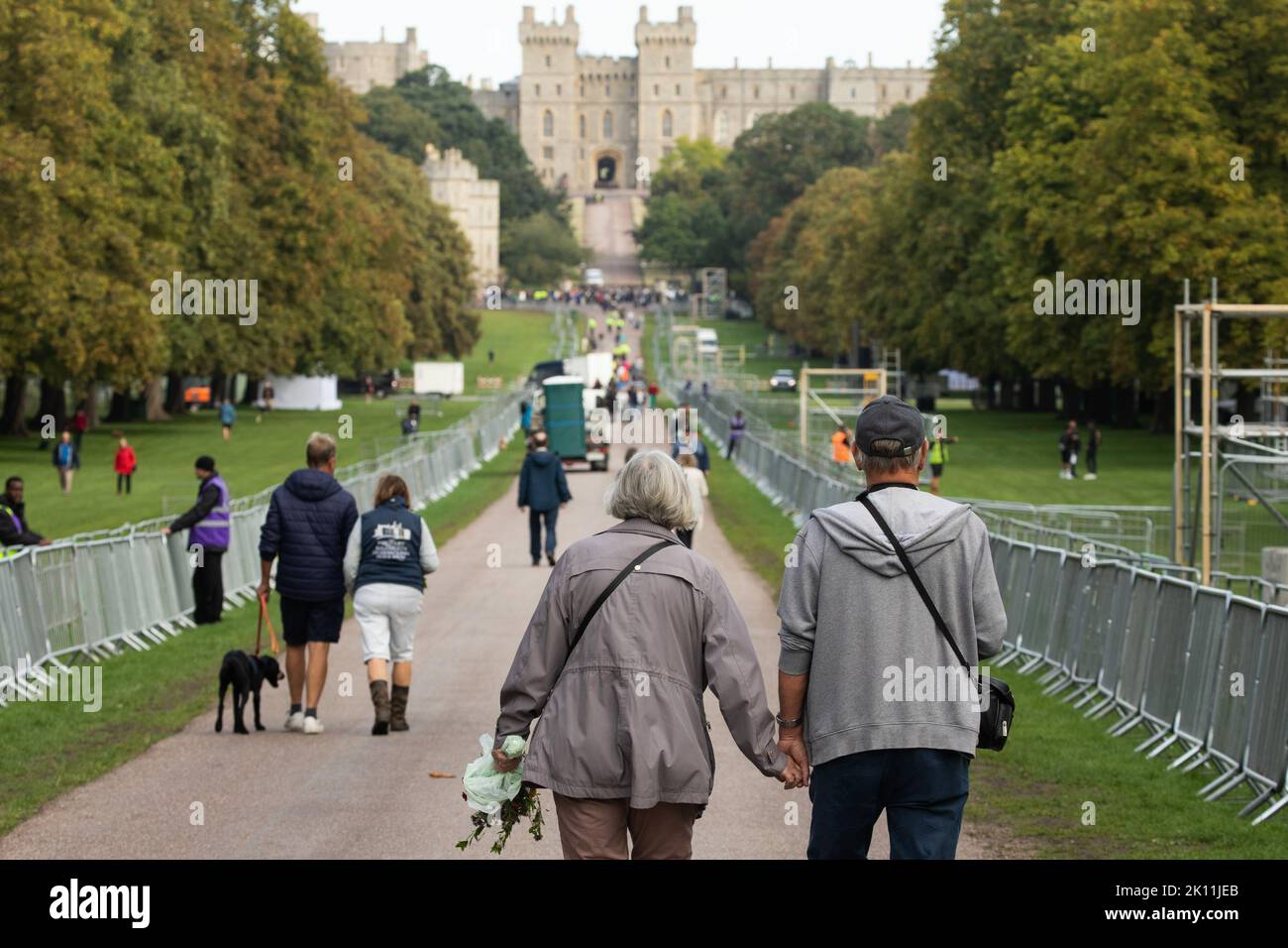 Windsor, UK. 14th September, 2022. Mourners proceed along the Long Walk ...