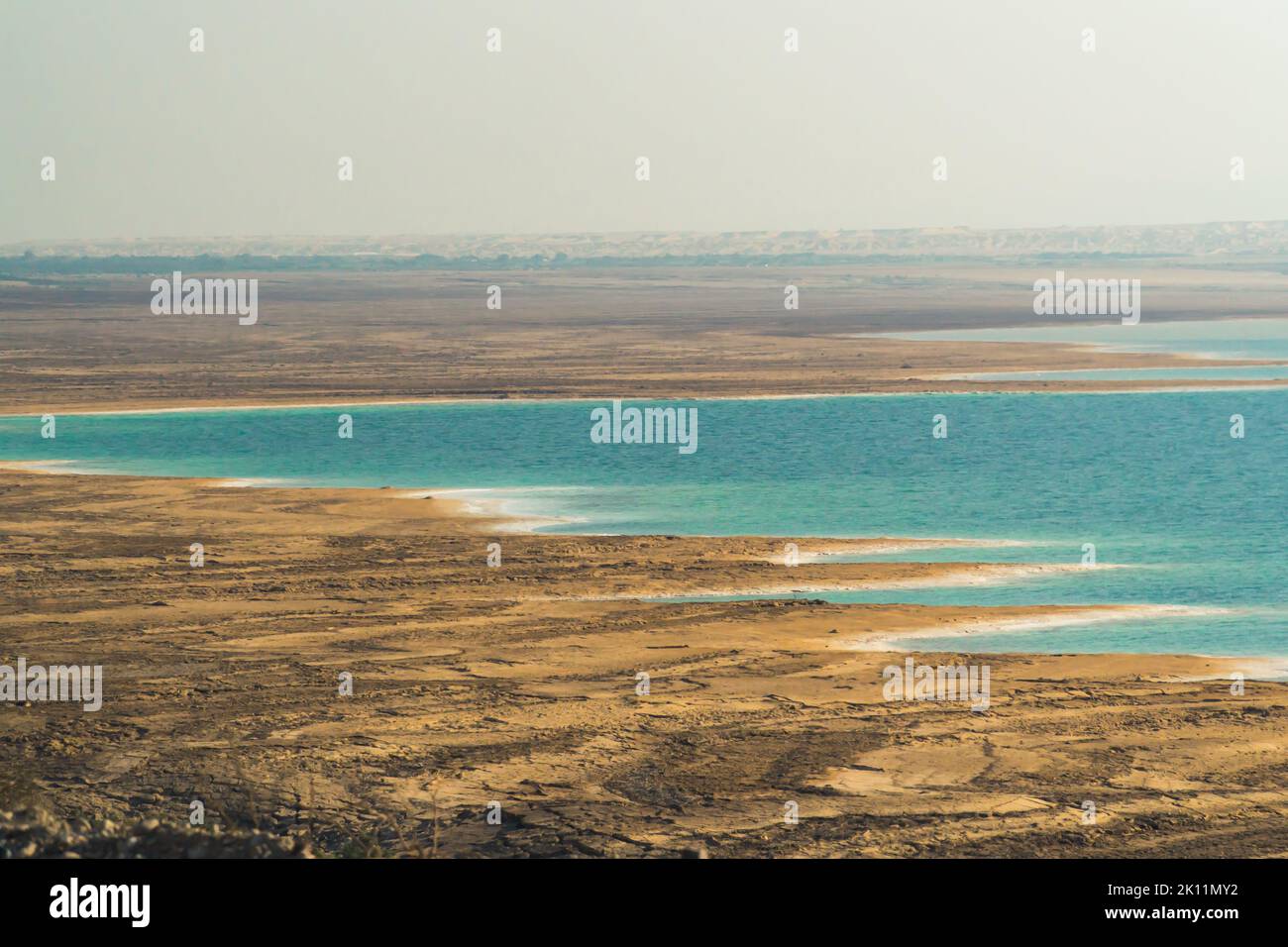 Dead sea, a national landmark in Jordan. blue water and sandy beach ...