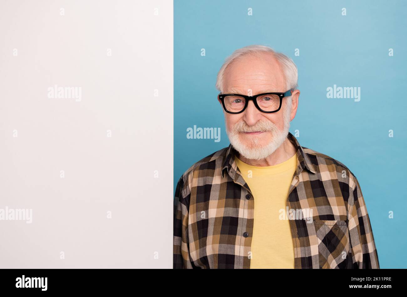 Photo of charming cute man pensioner dressed checkered shirt eyewear ...
