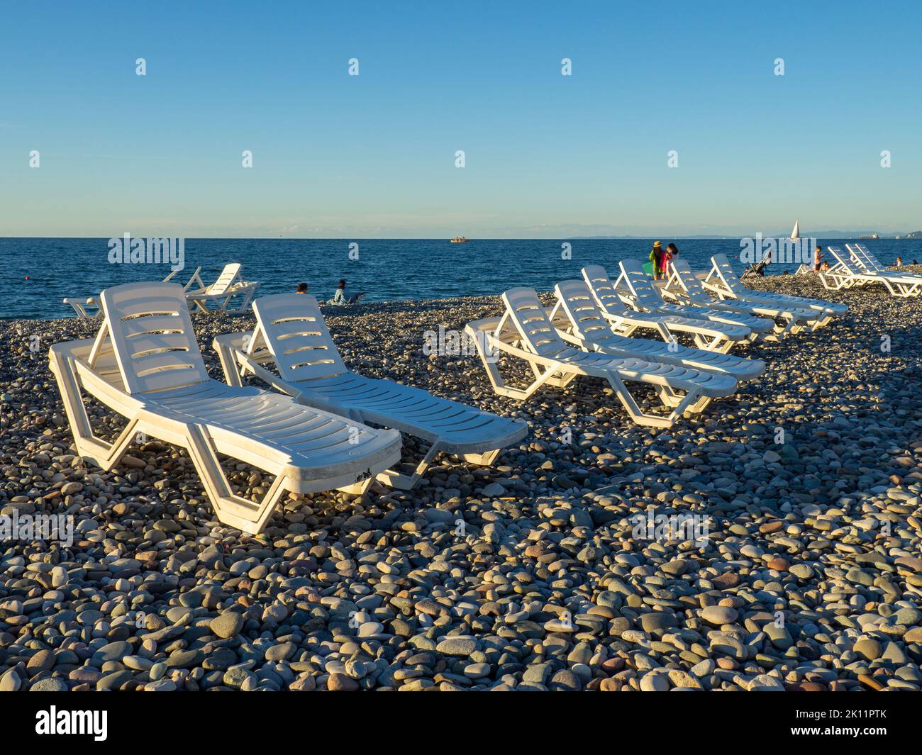 Beach beds. Folded beds. End of the season. On the Sunset. Beach ...