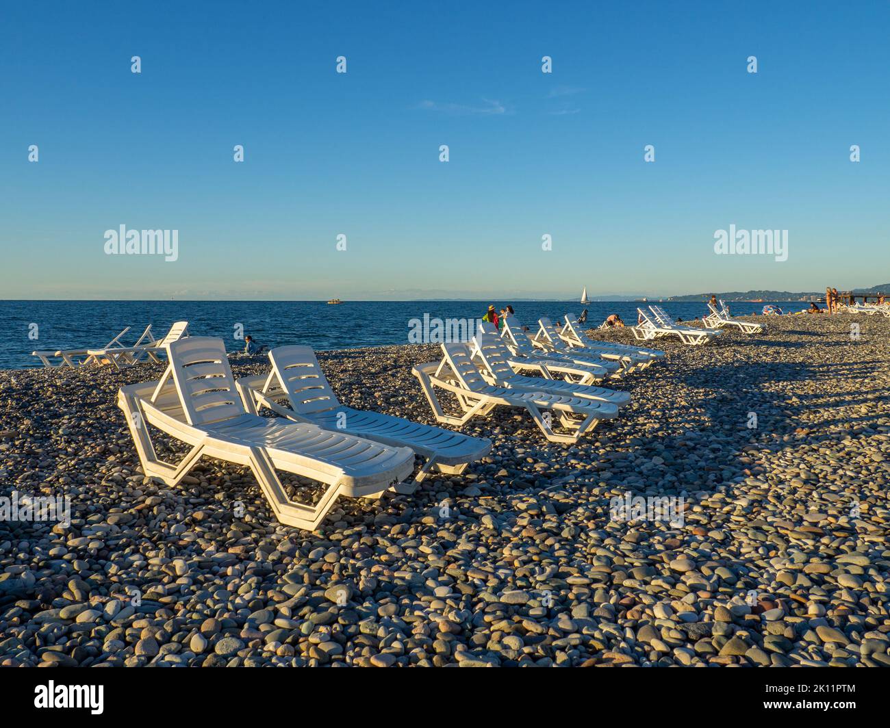 Beach beds. Folded beds. End of the season. On the Sunset. Beach ...