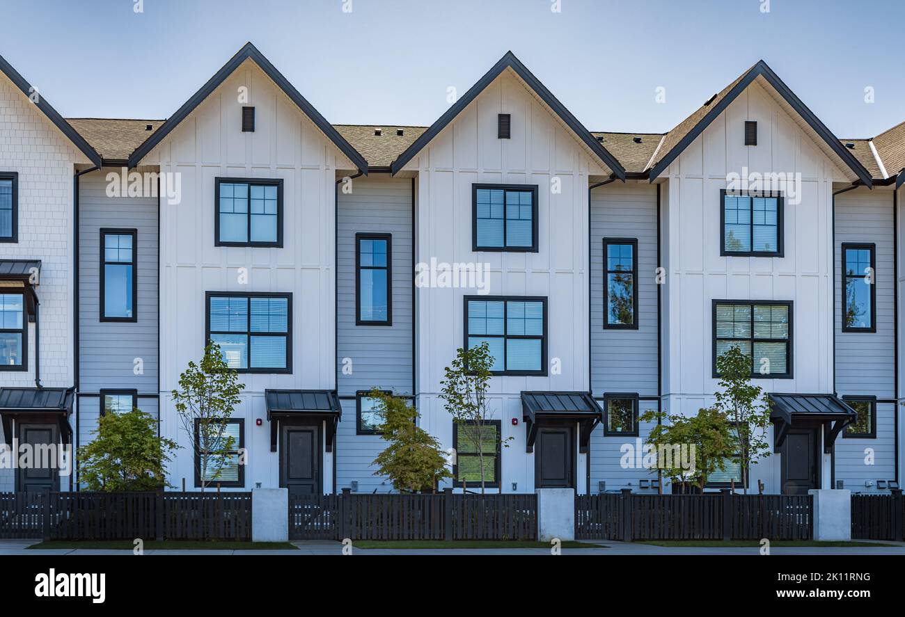 Brand new apartment building on sunny day in BC, Canada. Canadian ...