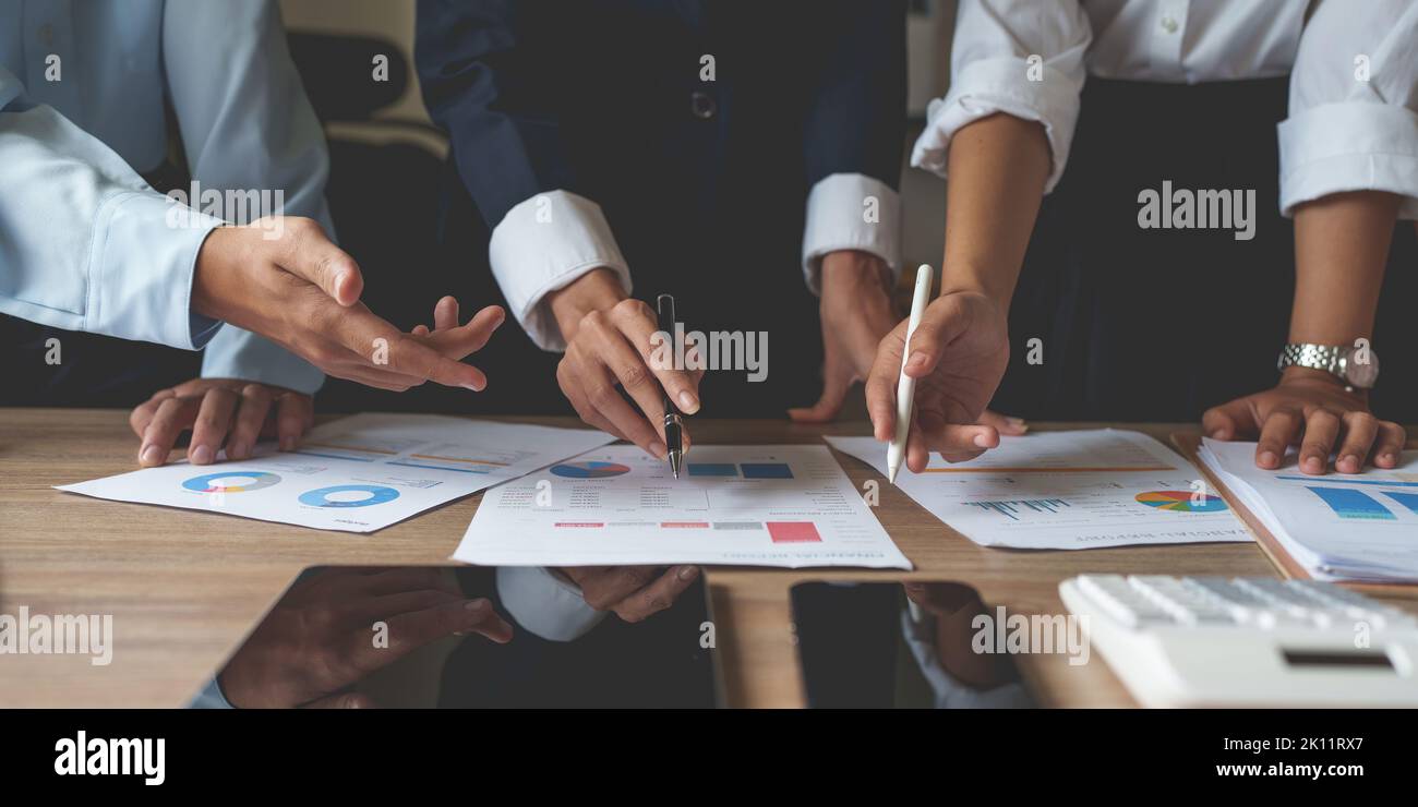 Business team hands at working with financial plan, meeting, discussion ...