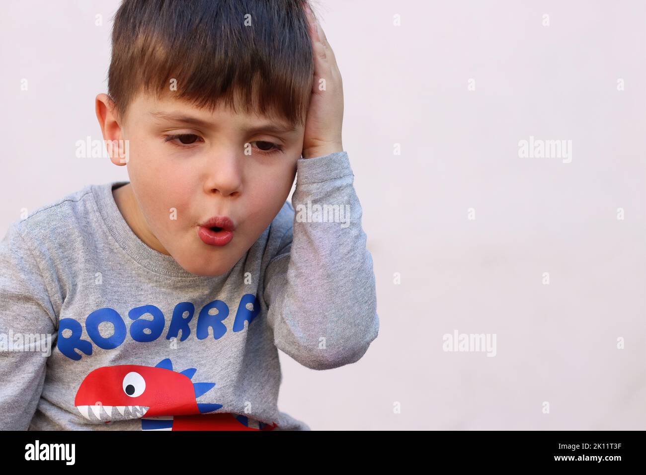boy portrait simulating expressions Stock Photo - Alamy
