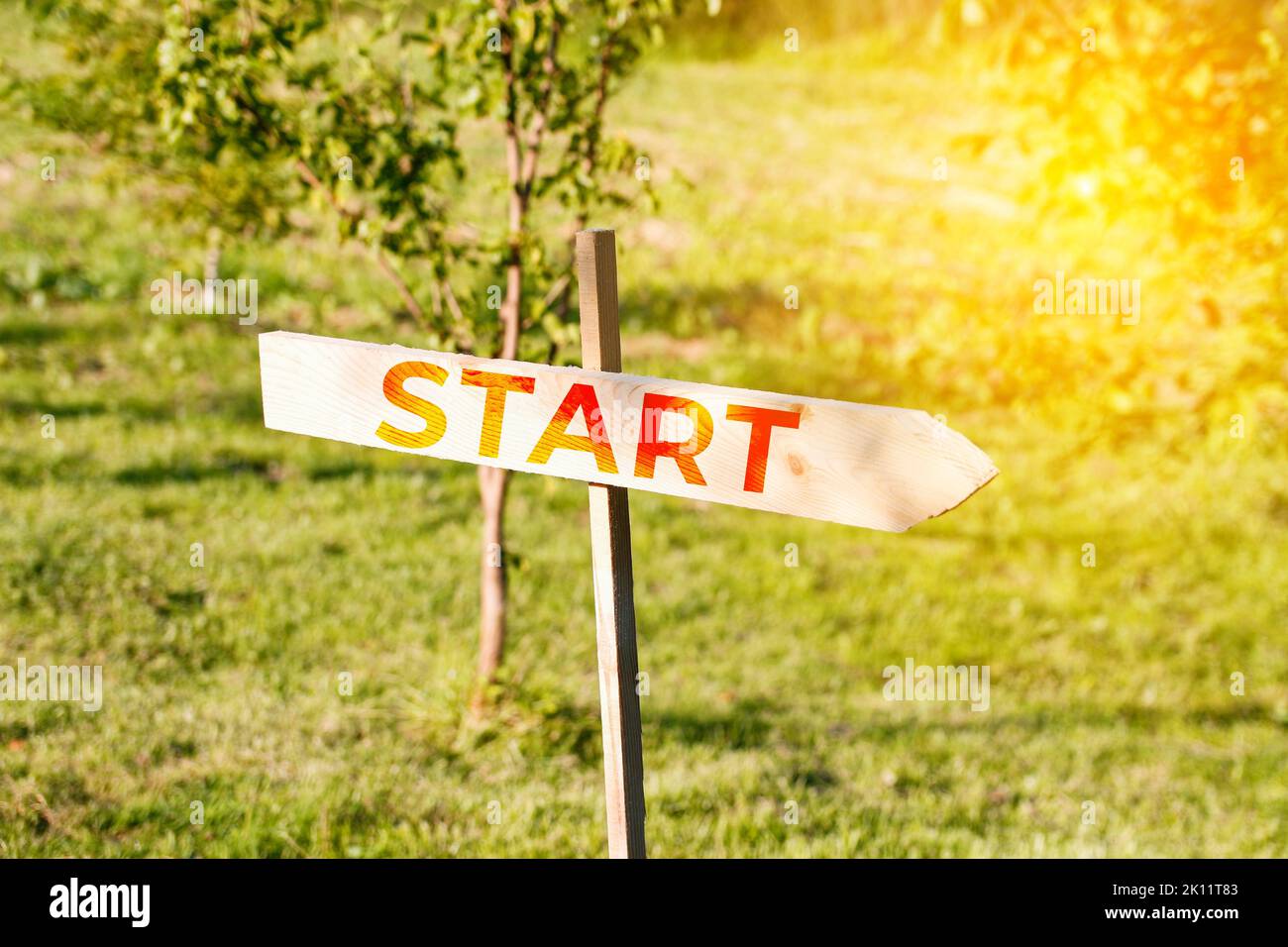 Defocus wooden sign. Start line on the highway concept for business ...