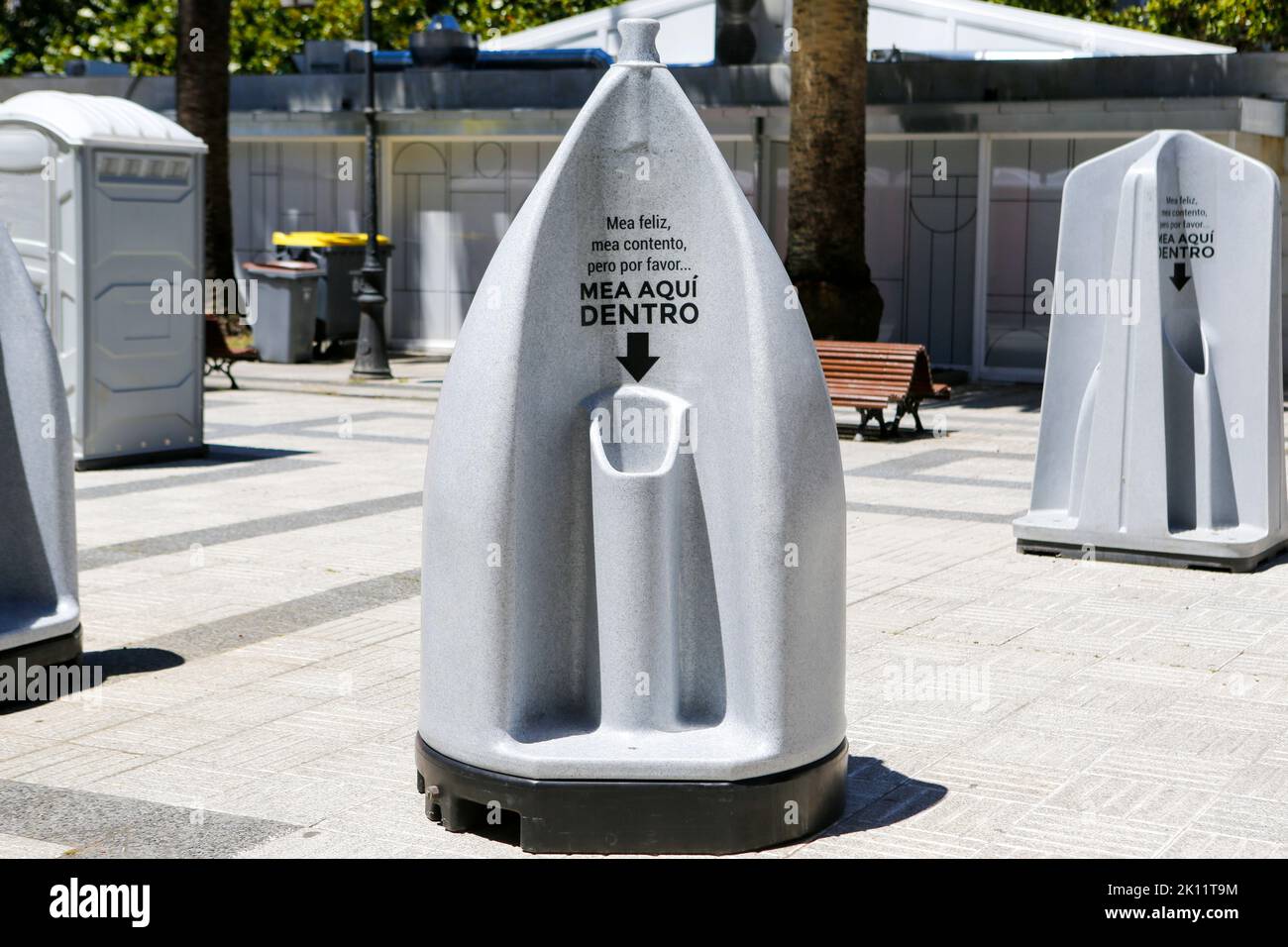 Gray mobile biological toilets for men in the park with the inscription ...