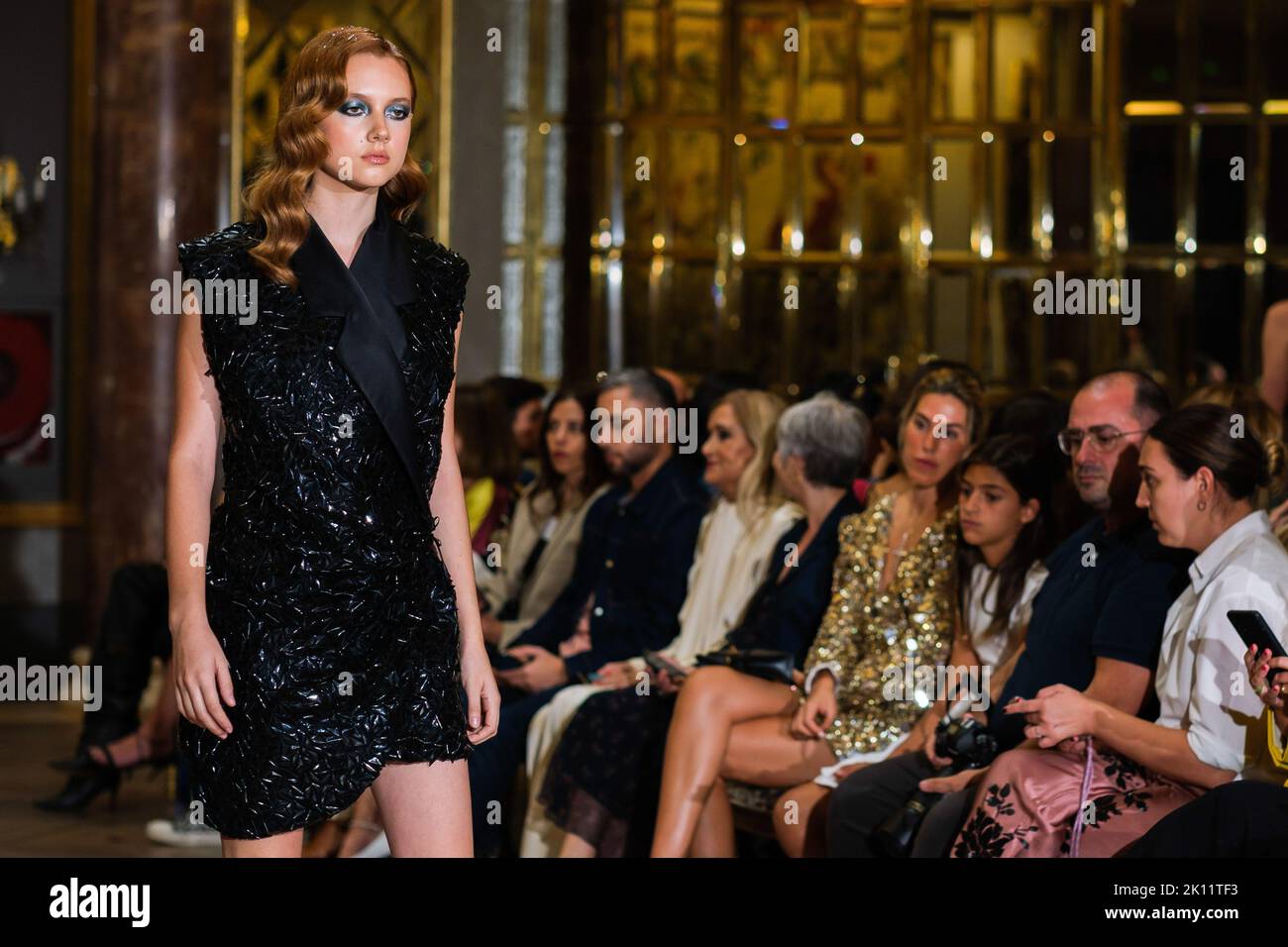 Madrid, Spain. 14th Sep, 2022. A model walks the runway wearing a ...