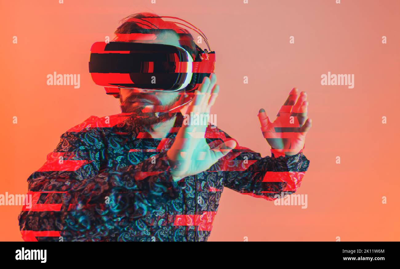 Glitch effect on caucasian bearded man in patterned shirt moving his ...
