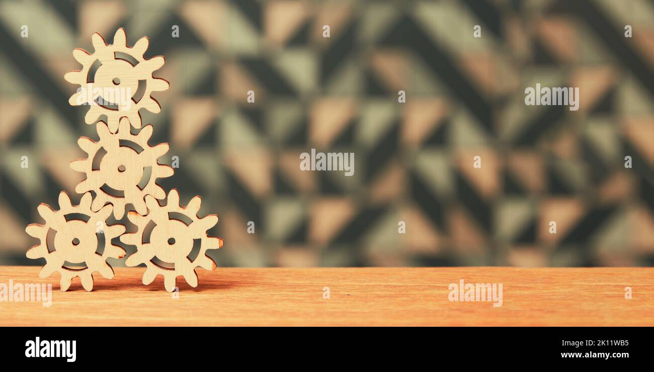 Wooden mechanical puzzle with a tower of gears and cogs. Toys ...