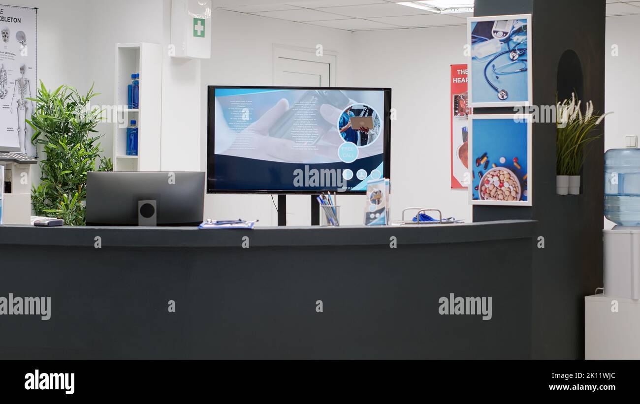 Empty reception desk with waiting room in clinic lobby, used for ...