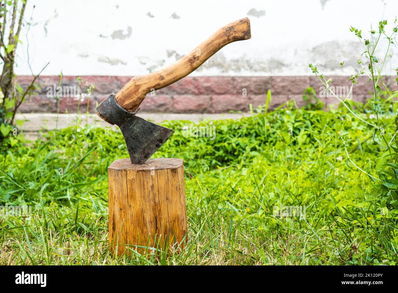 Antique sharp ax in a log Stock Photo - Alamy