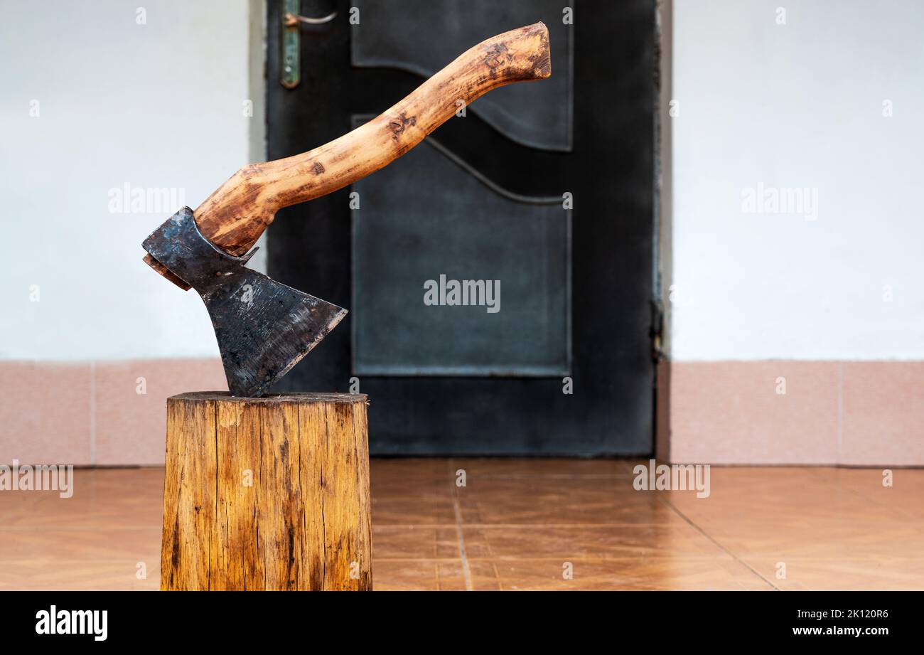 Antique sharp ax in a log Stock Photo - Alamy