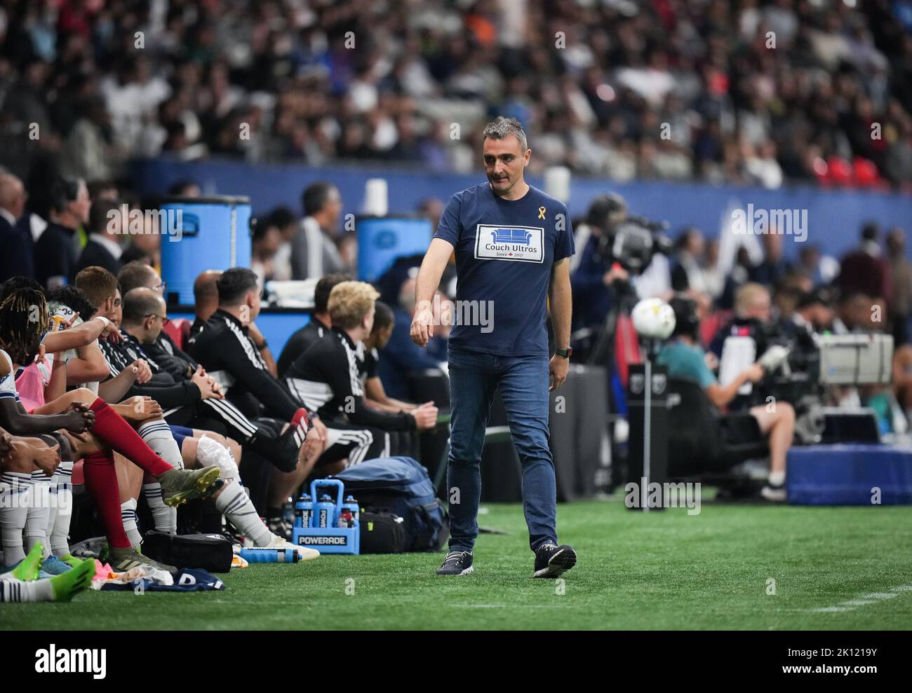 Vancouver Whitecaps head coach Vanni Sartini walks the sideline during ...