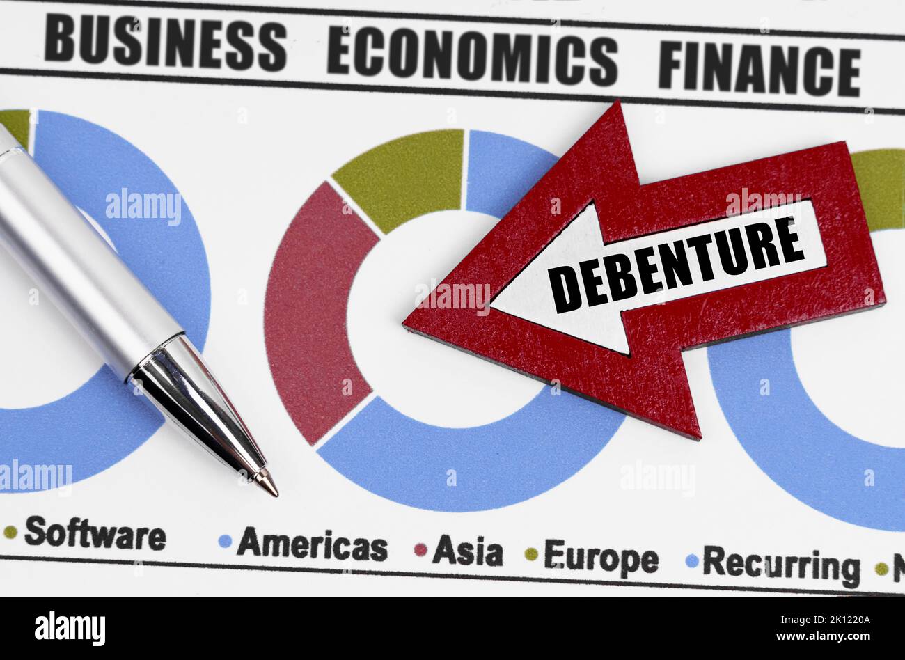 Business concept. Against the background of the diagrams, an arrow with ...