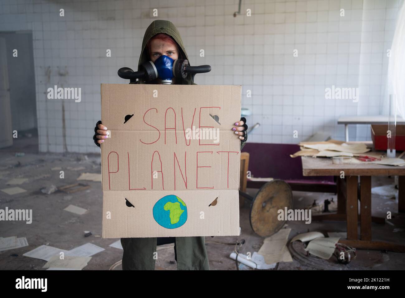 Woman post apocalyptic survivor with gas mask surrounded by smoke with ...