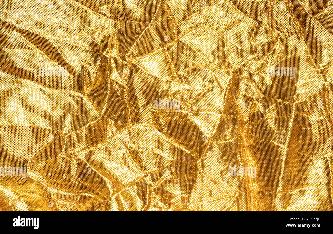 Gold background with fabric texture. High quality photo Stock Photo - Alamy