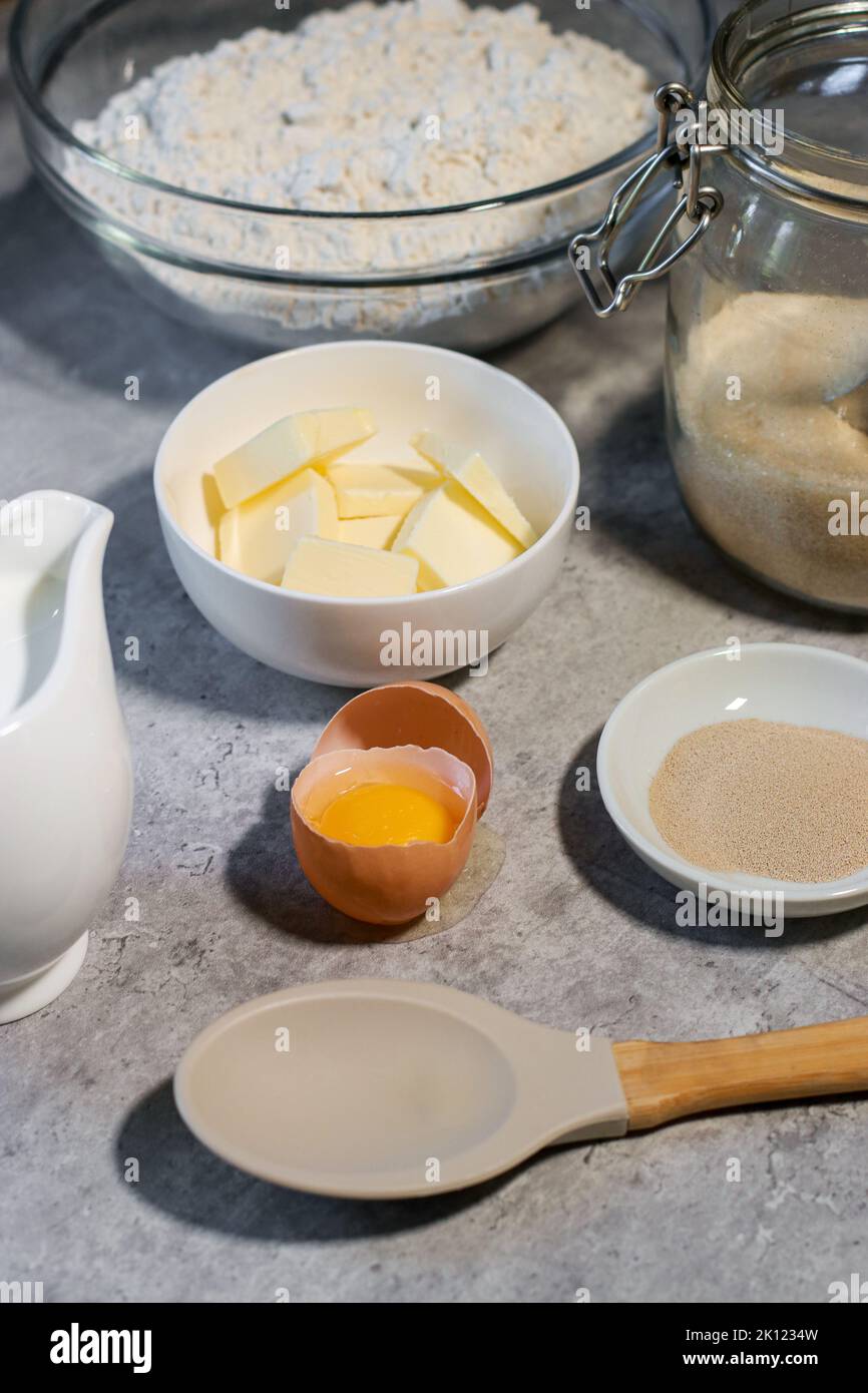 baking ingredients ob grey marble table Stock Photo - Alamy