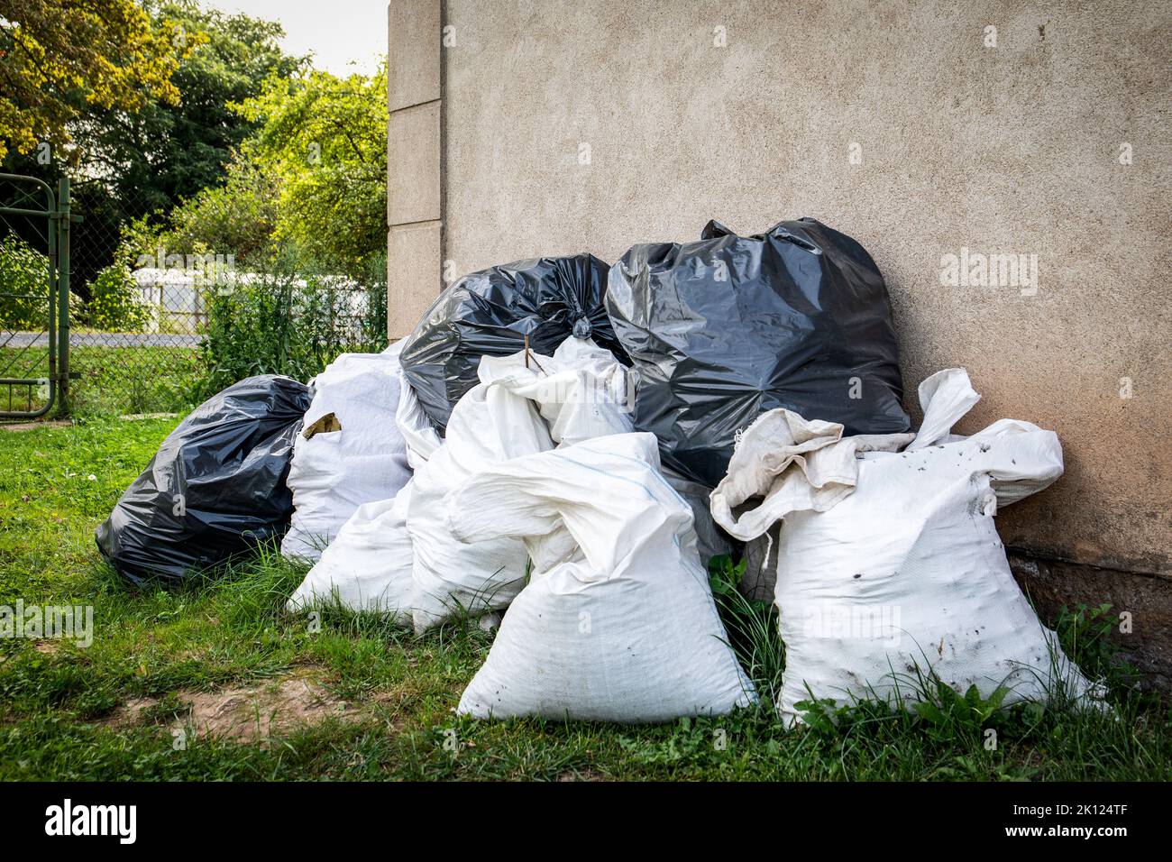 Garbage and construction debris in bags. Reconstruction and waste ...