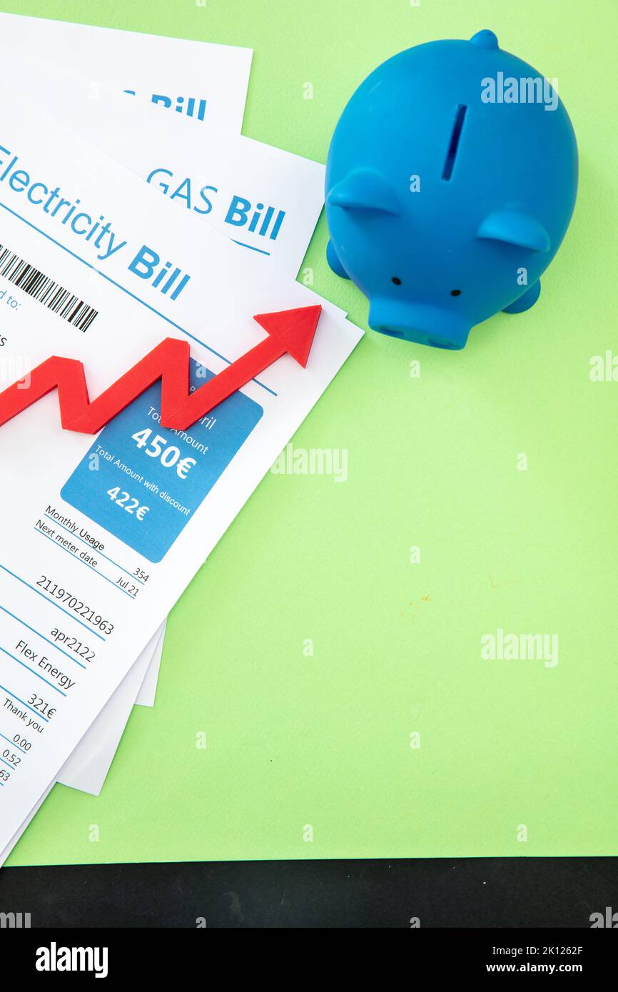 Electricity and gas bills, red rising up arrow and piggy bank. Heating ... Electricity and gas bills, red rising up arrow and piggy bank. Heating ...
