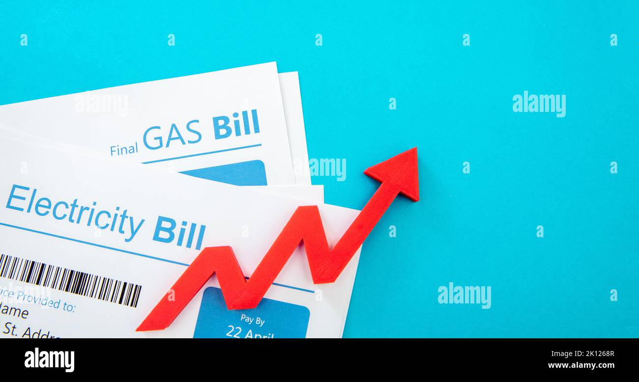 Utilities accounts and red rising up arrow. Electricity and gas bills ...